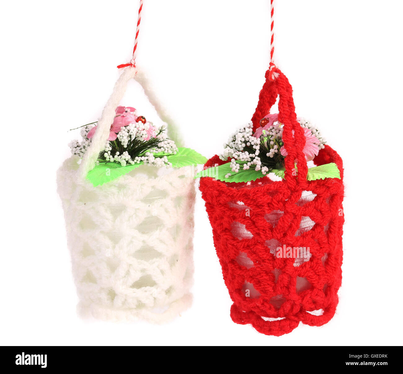 Flowers in white and red baskets Stock Photo - Alamy