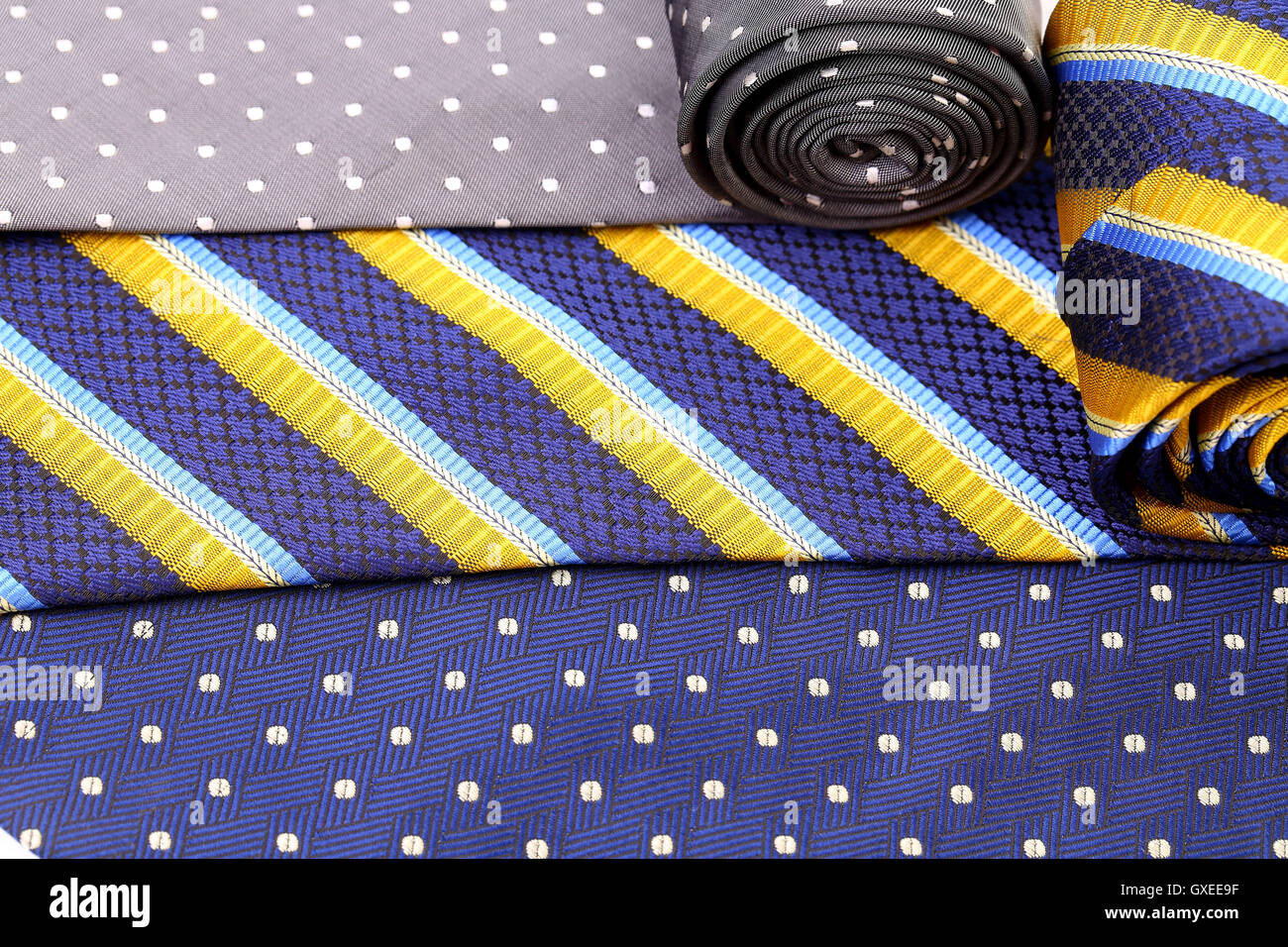 Three multi colored tie hi-res stock photography and images - Alamy