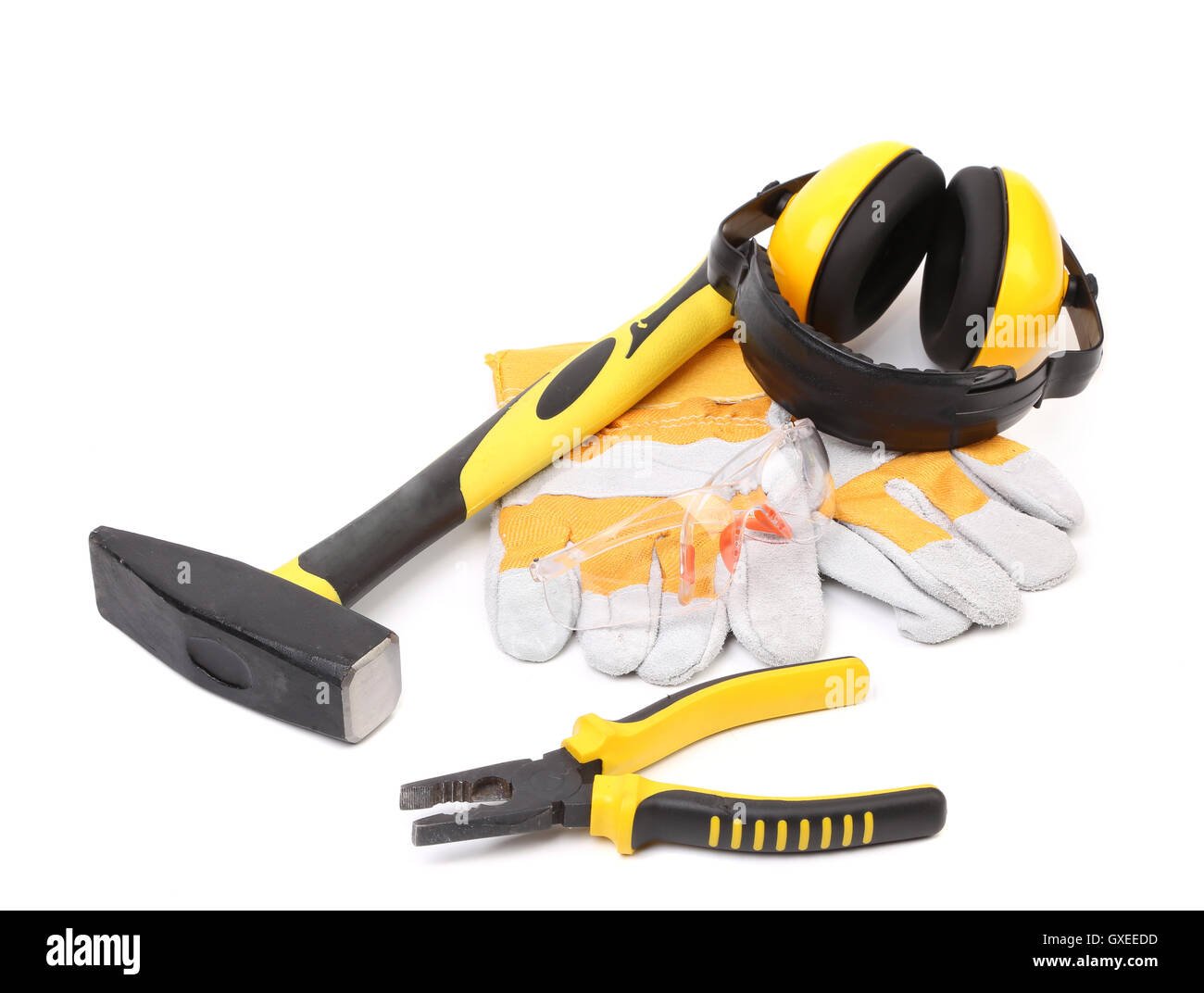 Protective ear muffs gloves and tools Stock Photo - Alamy