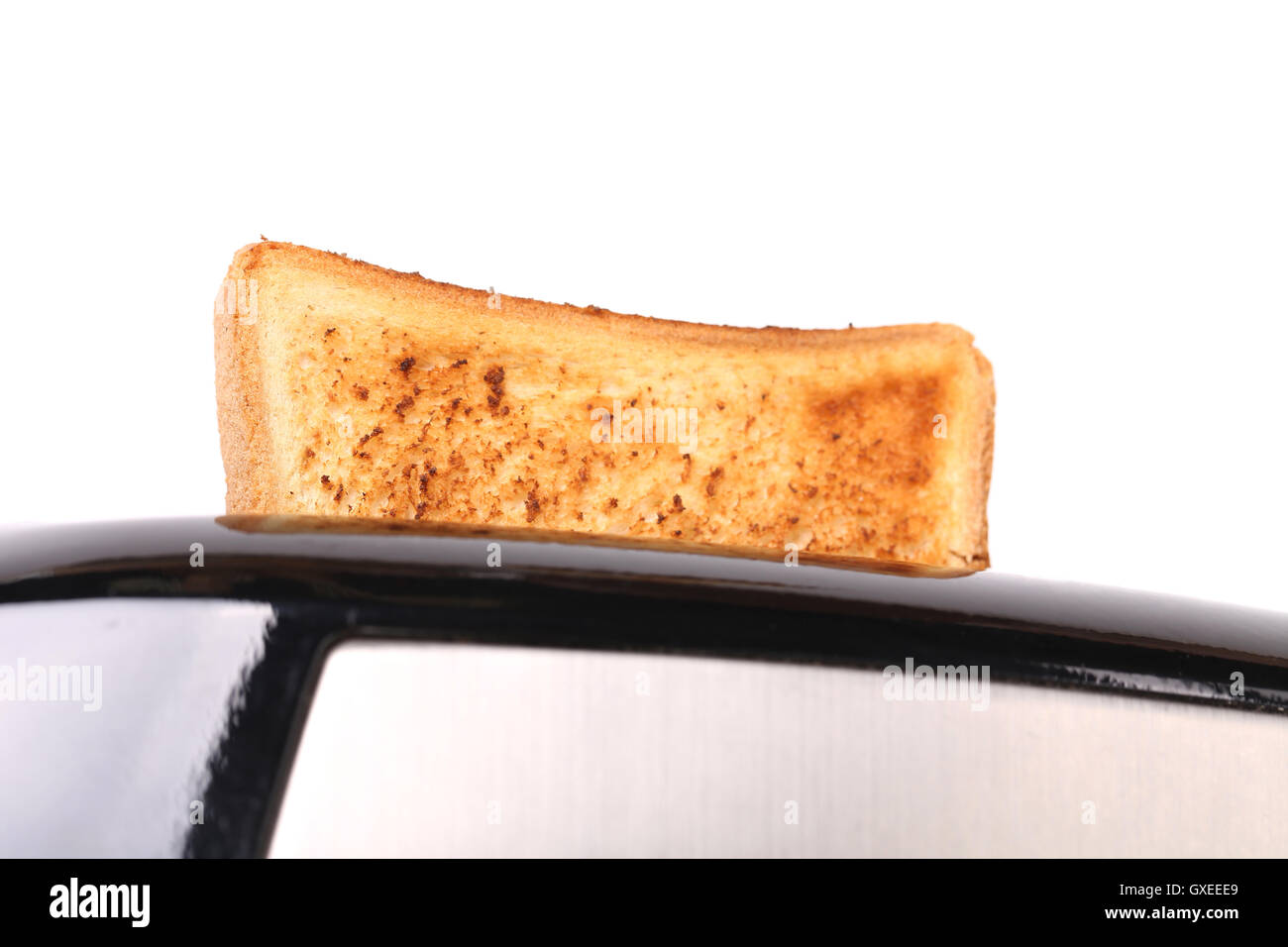 Toast out toaster in simple breakfast setting Stock Photo - Alamy