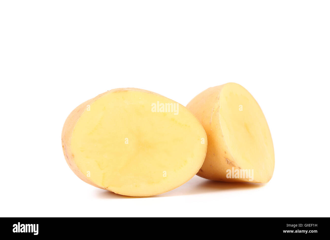 Cut in half potato Stock Photo - Alamy
