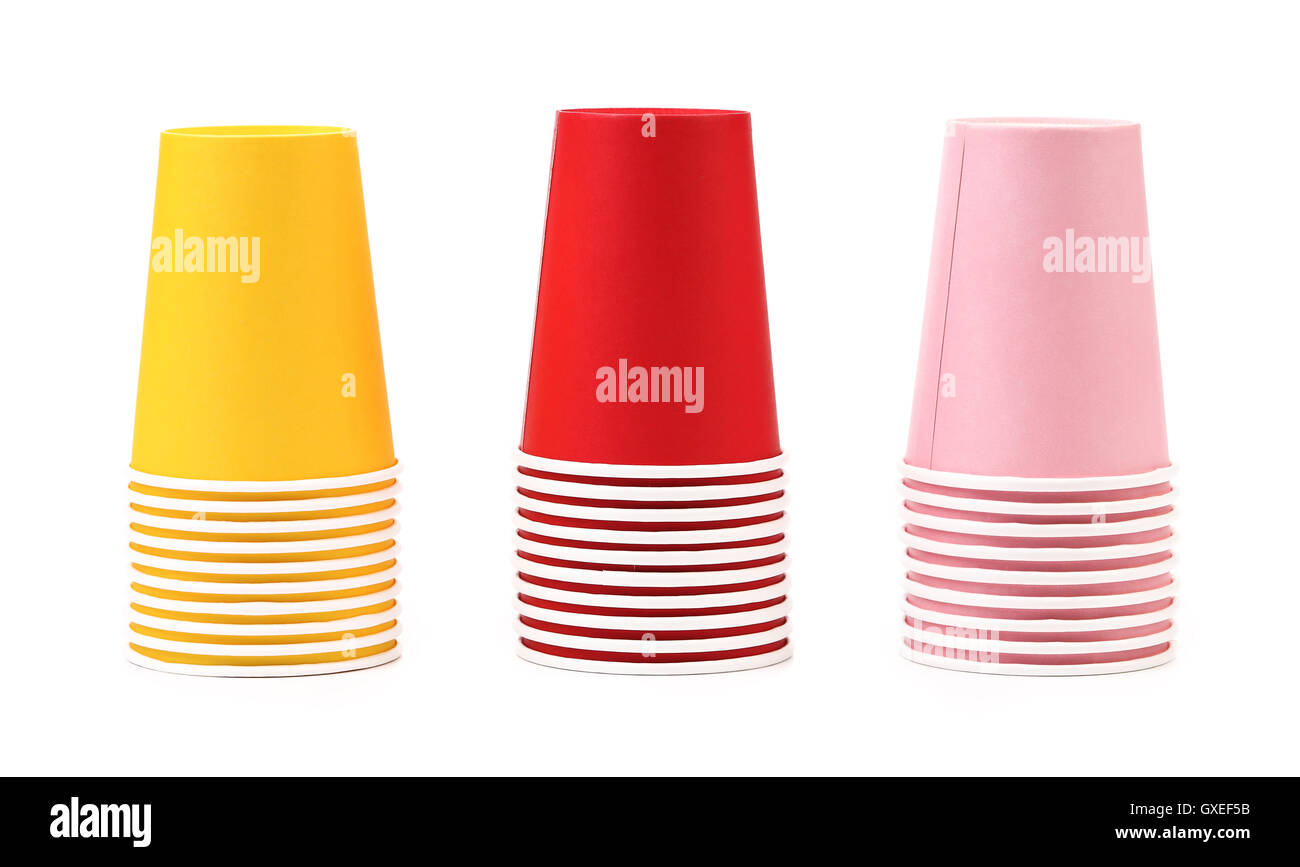 Three different color cups in a row Stock Photo - Alamy