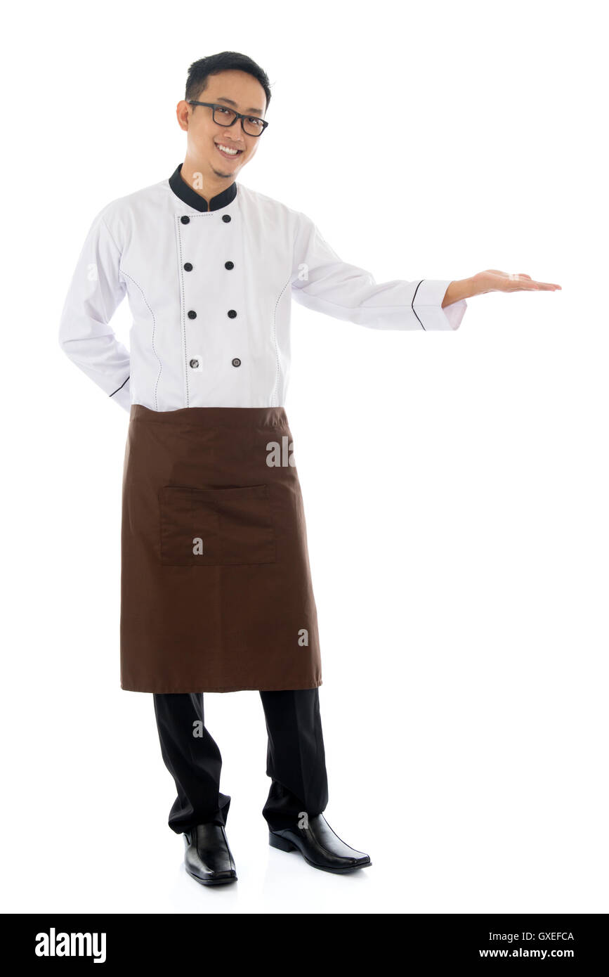 Asian male chef hand showing blank space Stock Photo - Alamy