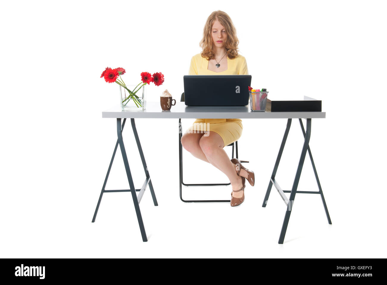 Serious working woman at the office Stock Photo - Alamy