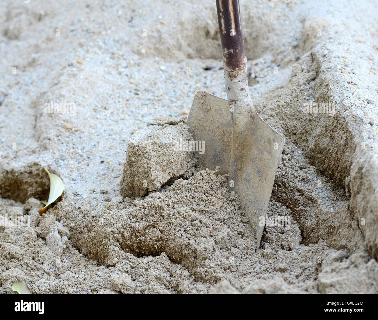 Sand with shovels Stock Photo - Alamy