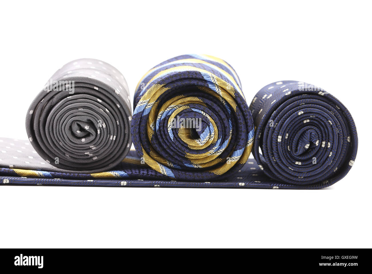 Three rolls of multi-colored tie Stock Photo - Alamy