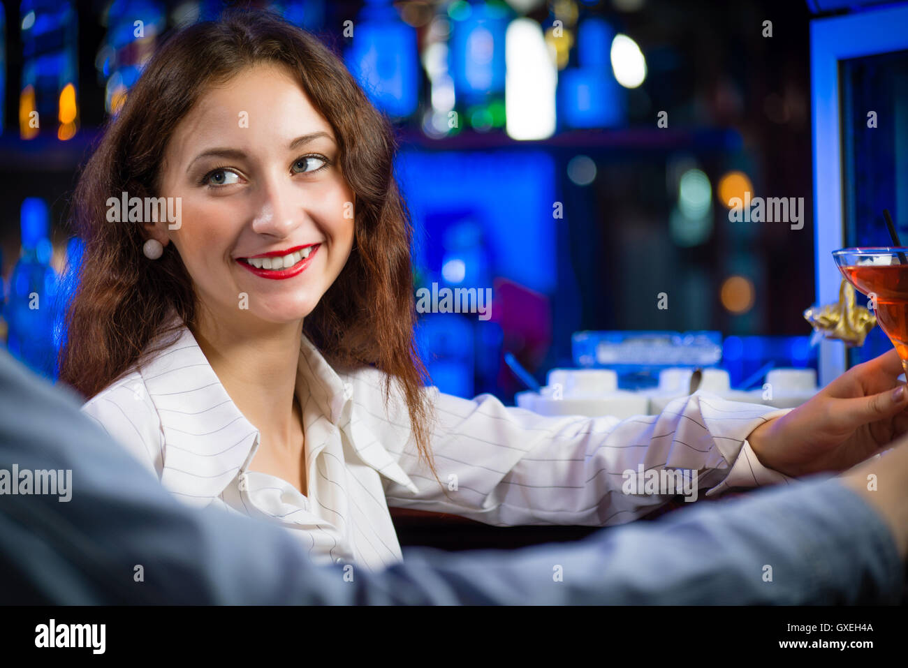 young woman in a bar Stock Photo - Alamy