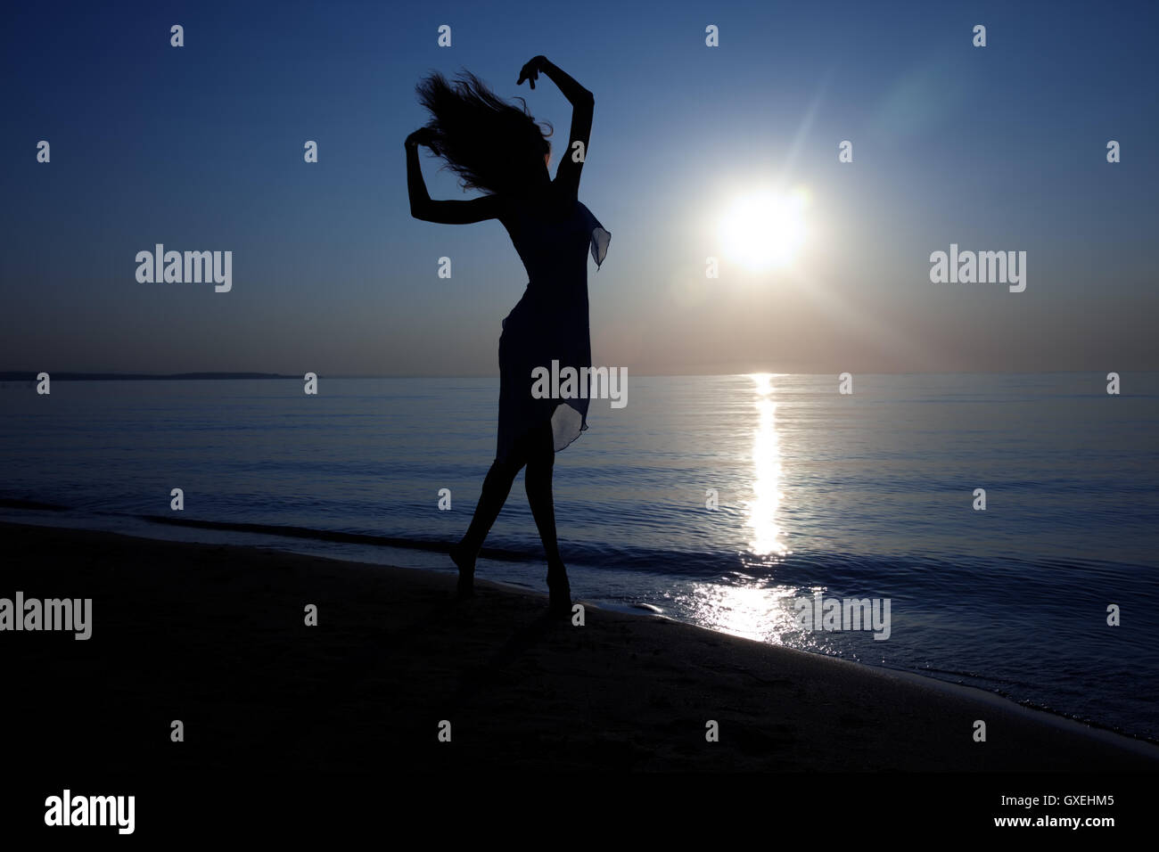 Dance at sunset Stock Photo - Alamy