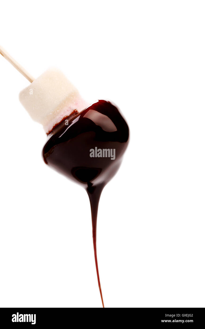 Marshmallow in chocolate syrop Stock Photo - Alamy