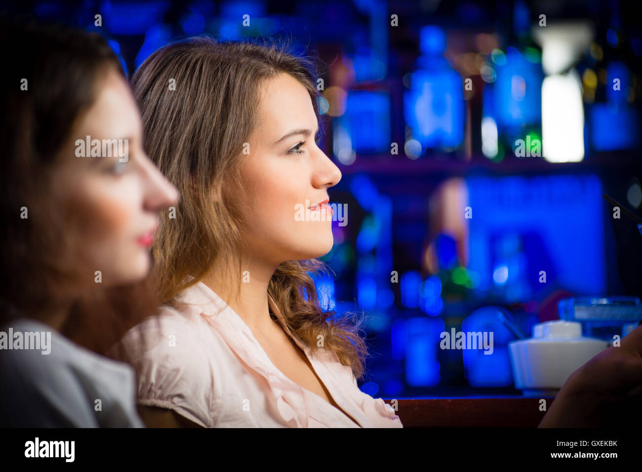 young woman in a bar Stock Photo - Alamy