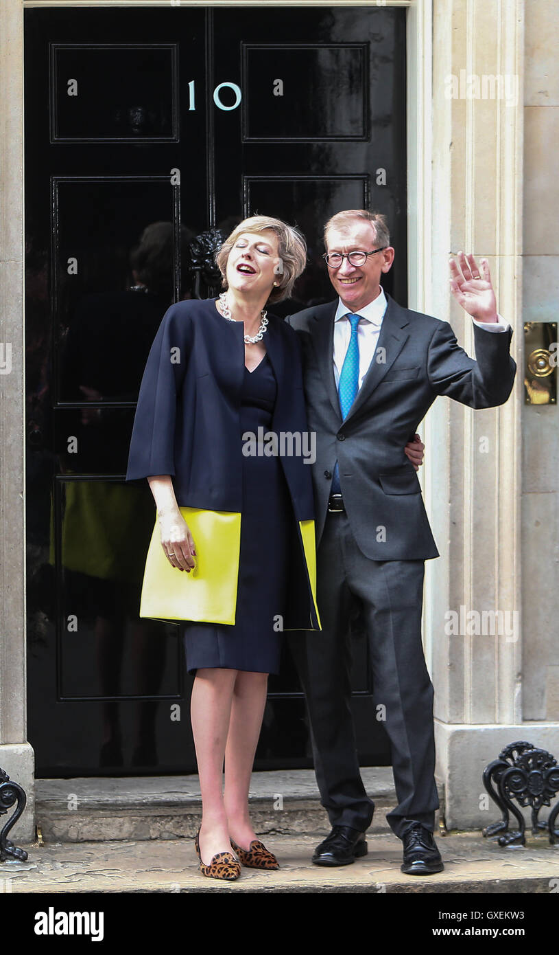 Theresa May arrives in Downing Street alongside her husband, Philip ...