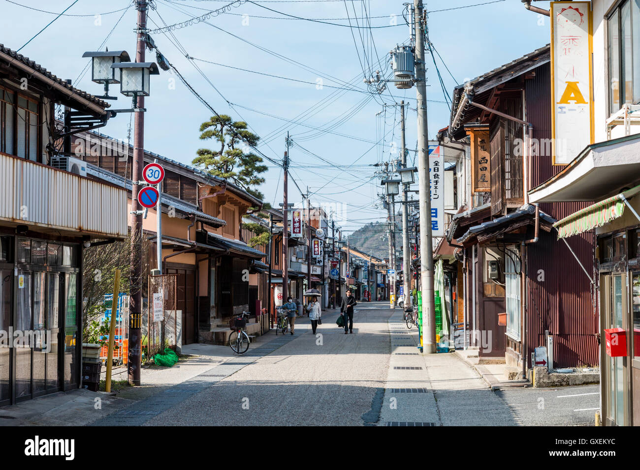 Japan, Izushi. Main tourist street, electric and phone poles, wooden ...