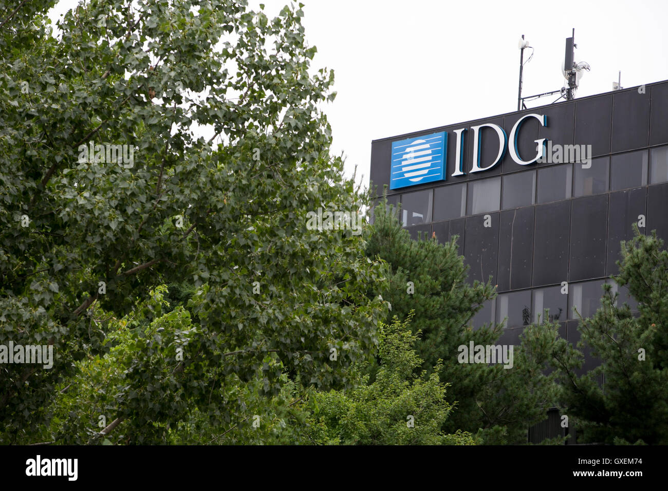 A logo sign outside of the headquarters of International Data Group ...
