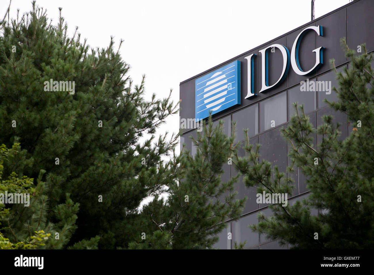 A logo sign outside of the headquarters of International Data Group ...