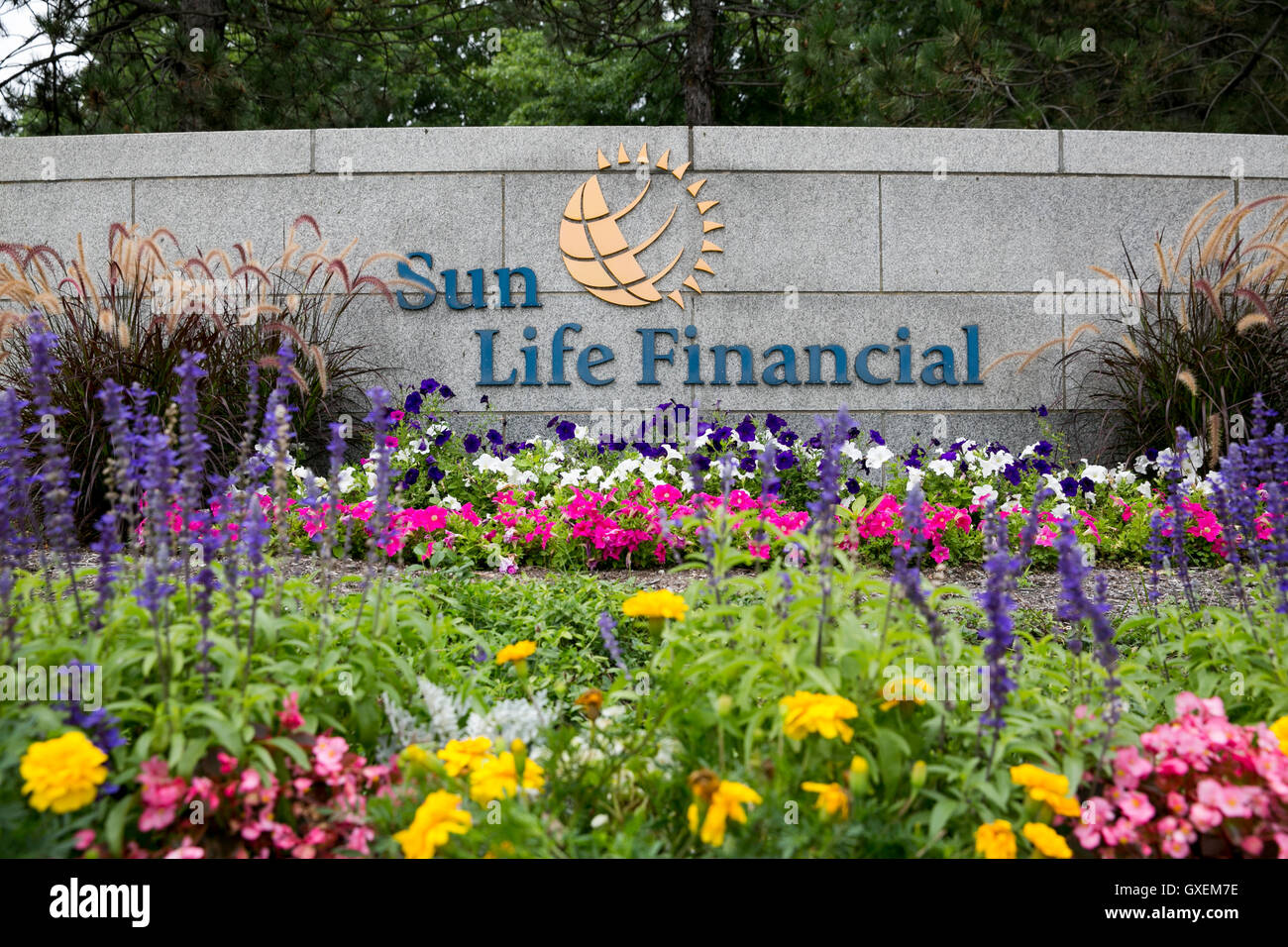A logo sign outside of a facility occupied by Sun Life Financial, Inc ...