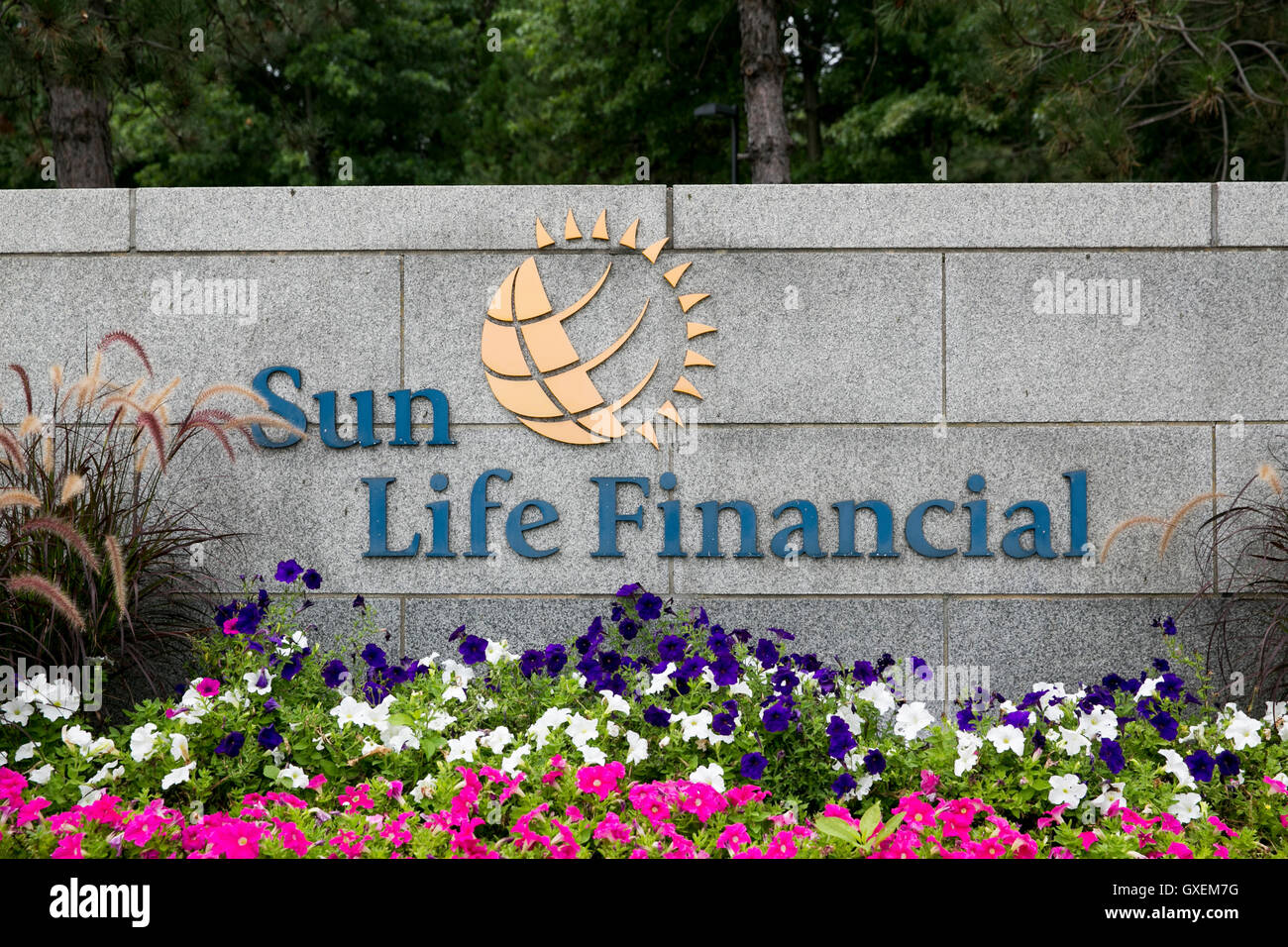 A logo sign outside of a facility occupied by Sun Life Financial, Inc ...