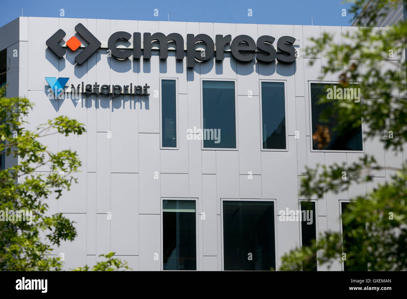 A logo sign outside of a facility occupied by Cimpress N.V., the parent company of Vistaprint ...