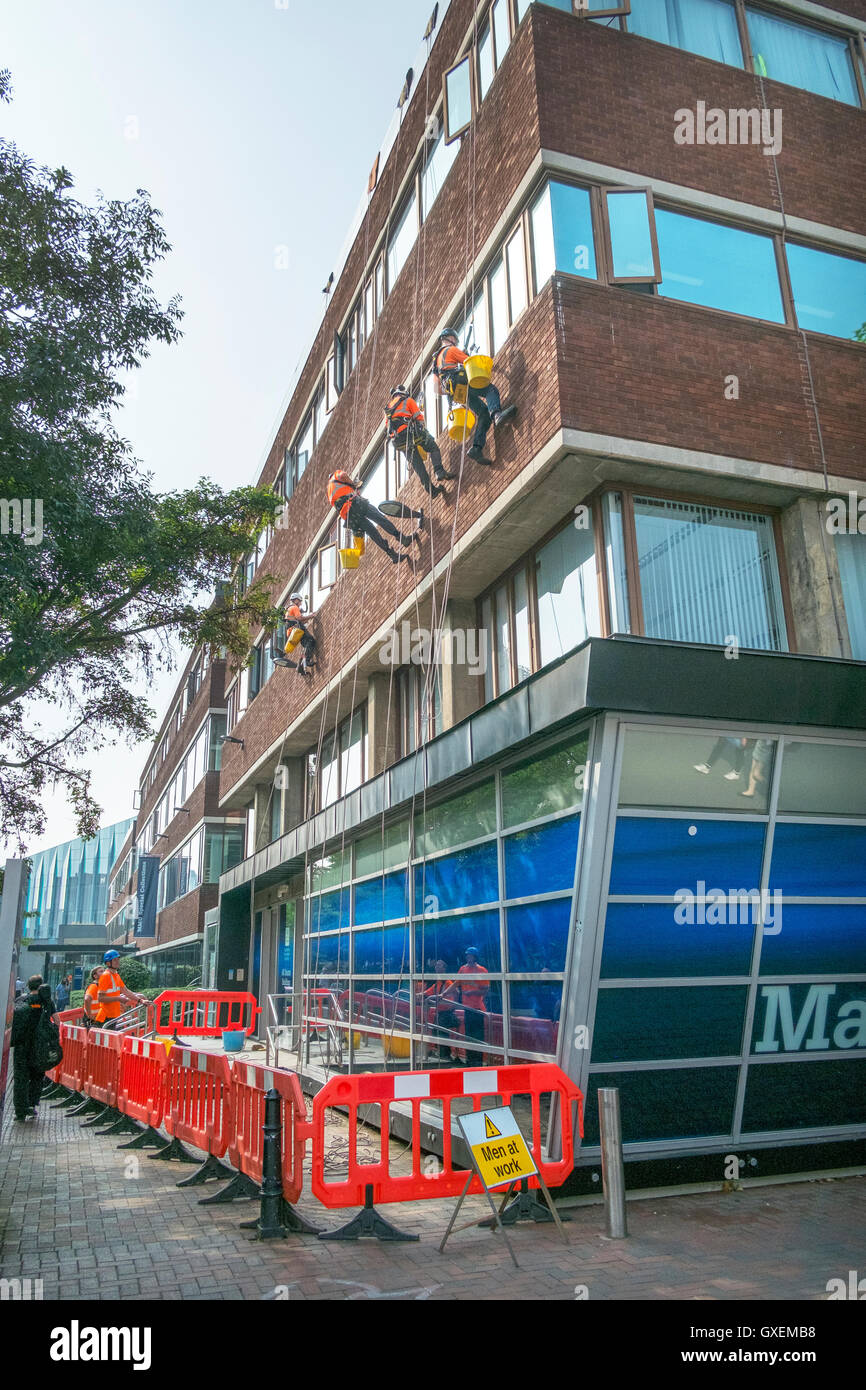 Men working on building in Manchester's student area, Oxford, Road ...