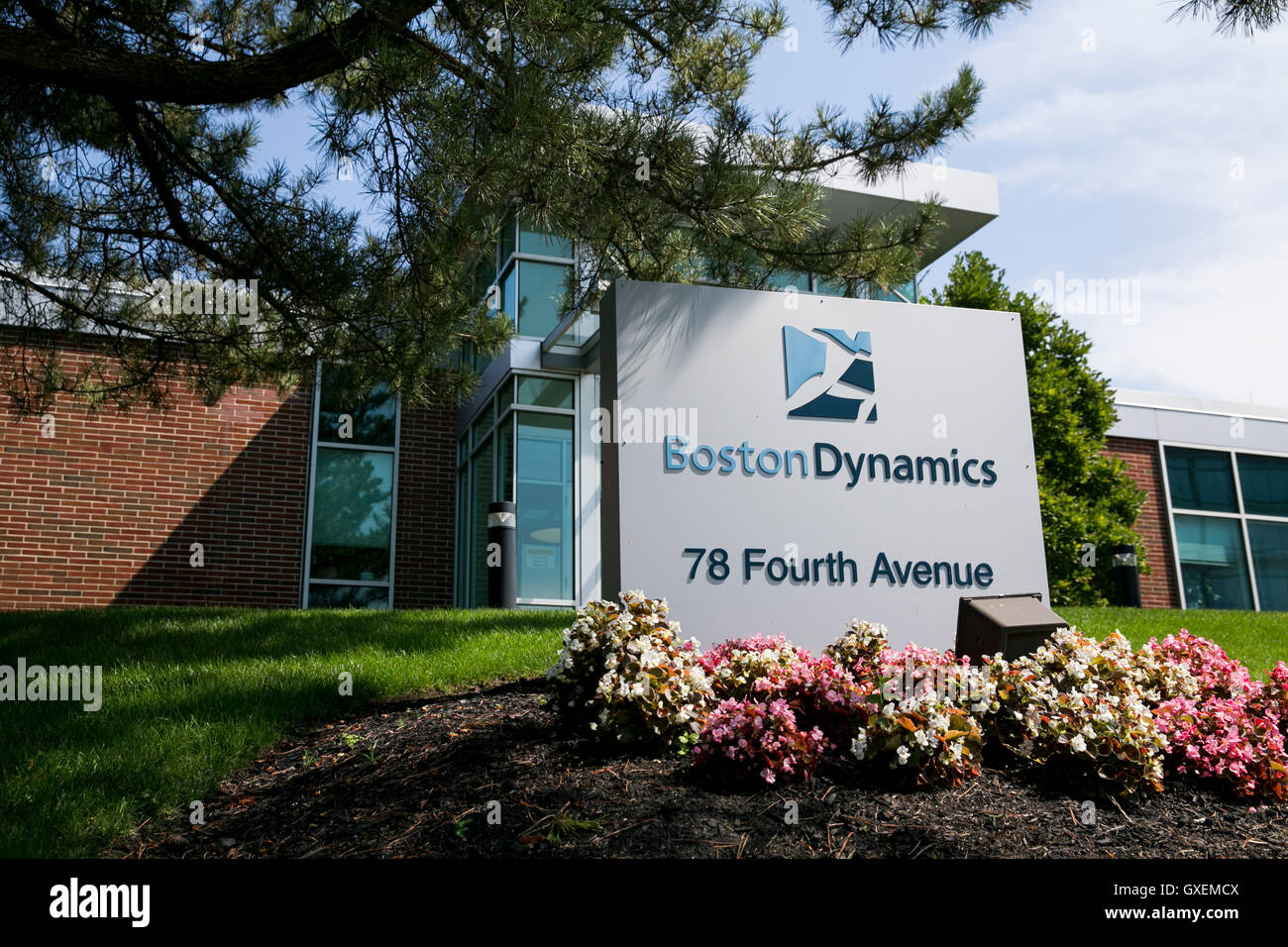 A logo sign outside of the headquarters of Boston Dynamics in Waltham ...
