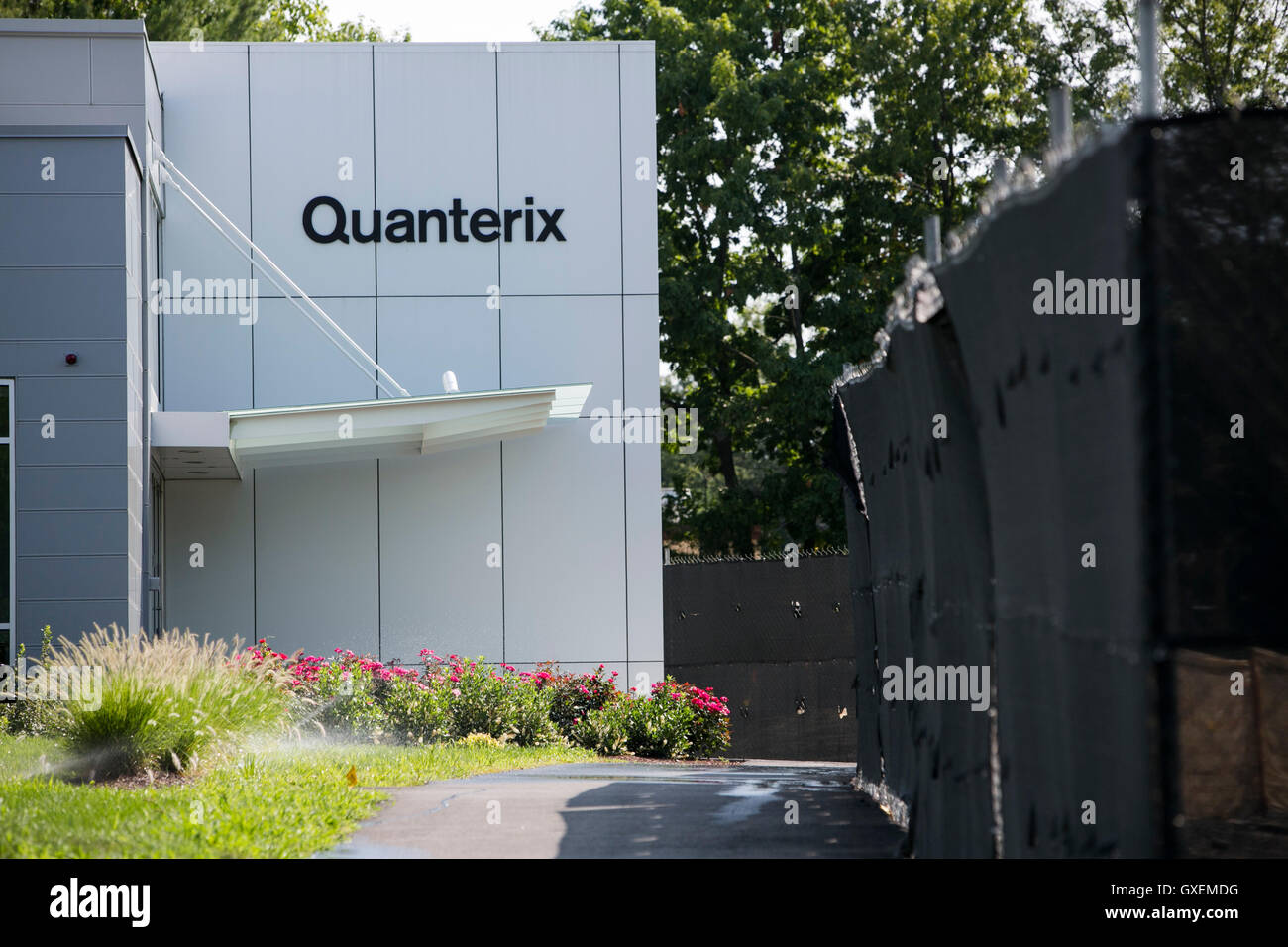 A logo sign outside of the headquarters of the Quanterix Corporation in ...