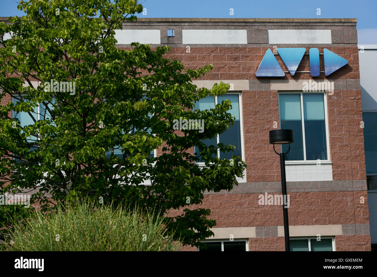 A logo sign outside of the headquarters of Avid Technology, Inc., in ...