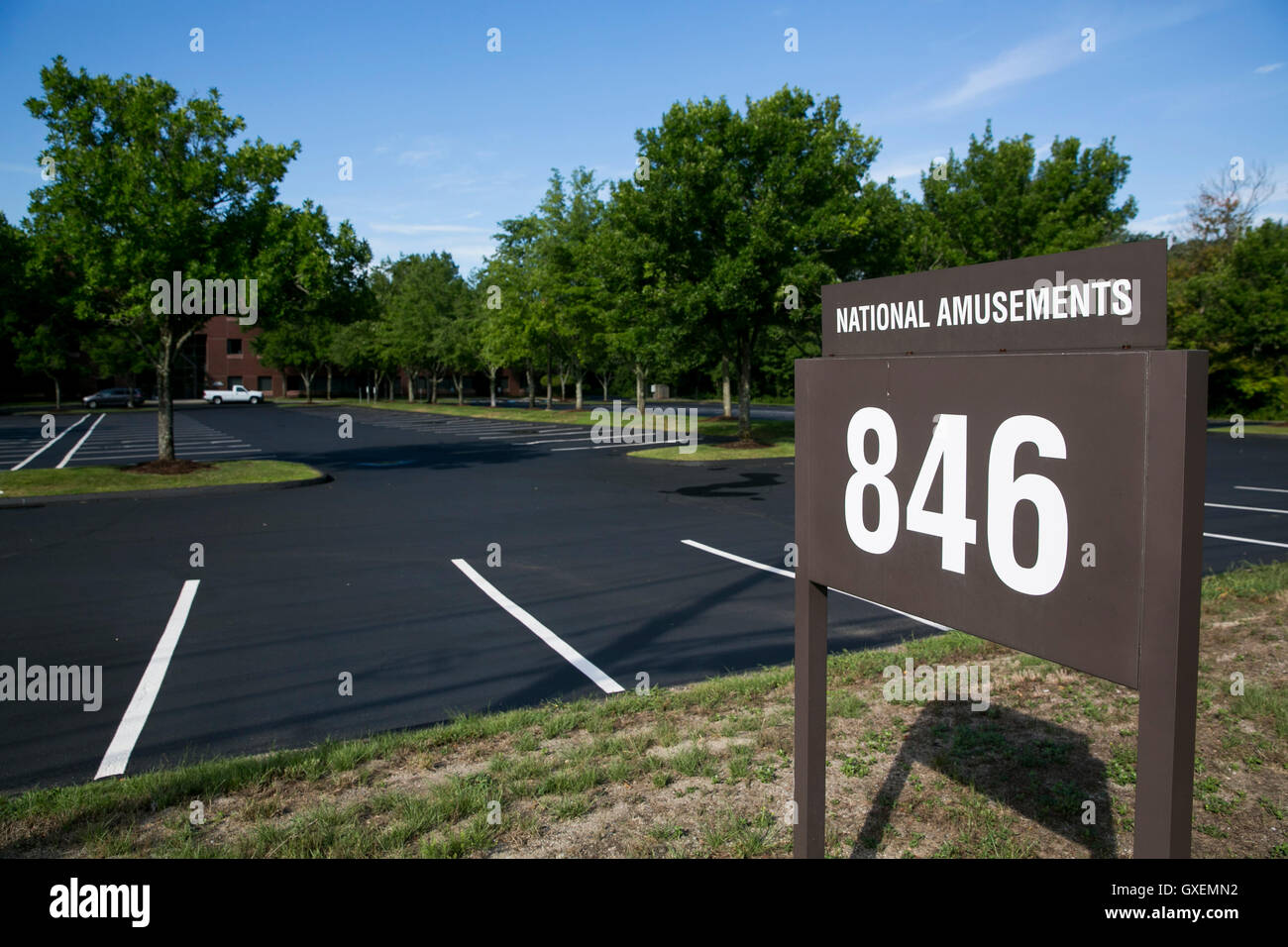 A logo sign outside of the headquarters of National Amusements, Inc ...