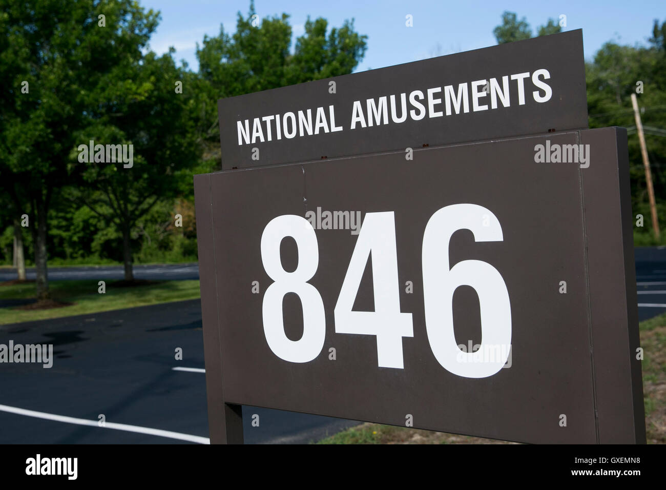 A logo sign outside of the headquarters of National Amusements, Inc ...