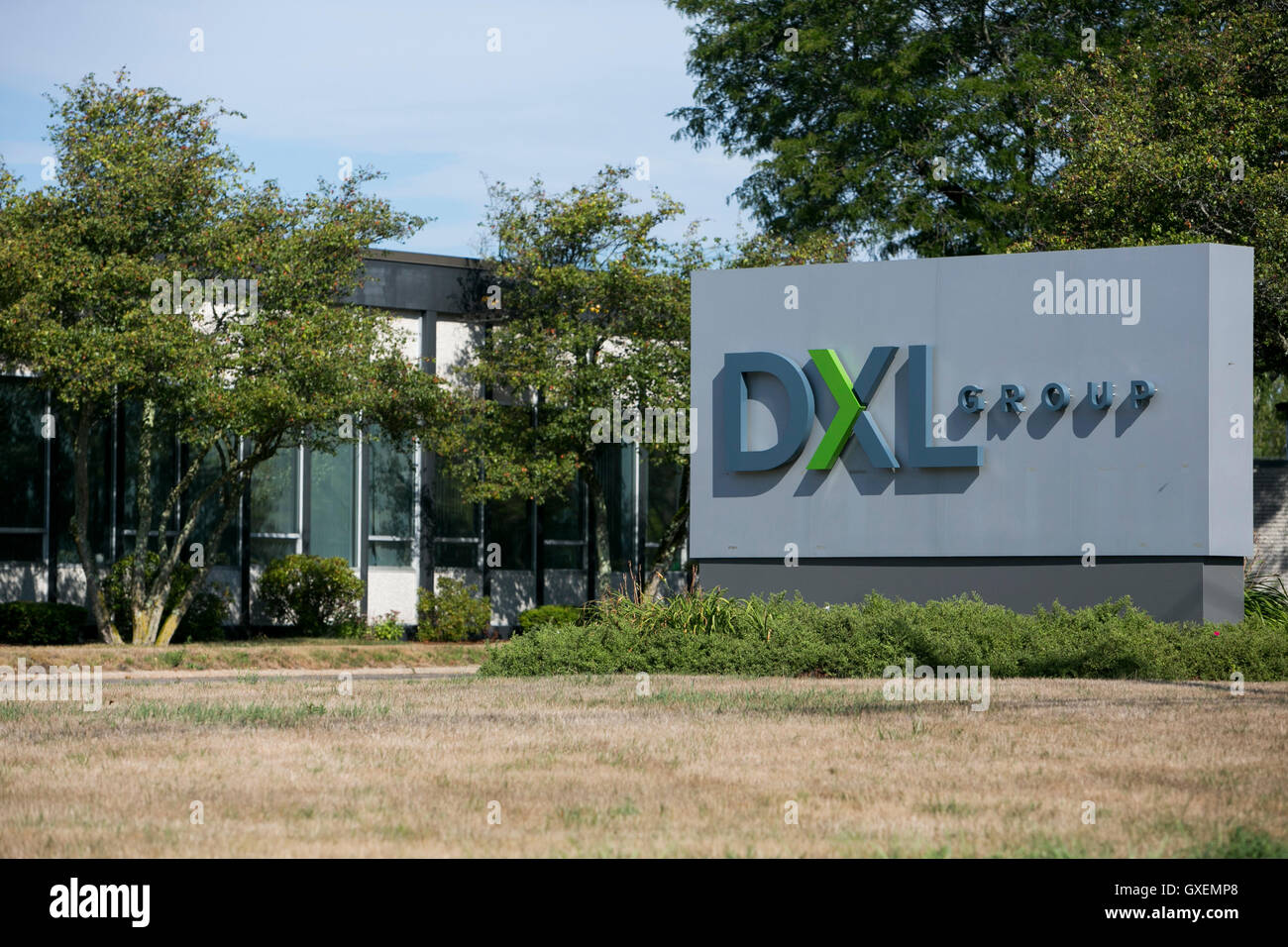 A logo sign outside of the headquarters of Destination XL Group, Inc ...