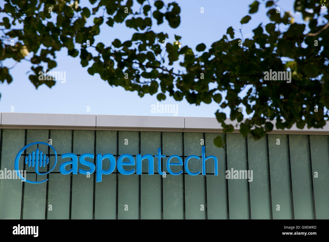 A logo sign outside of the headquarters of Aspen Technology, Inc., also ...
