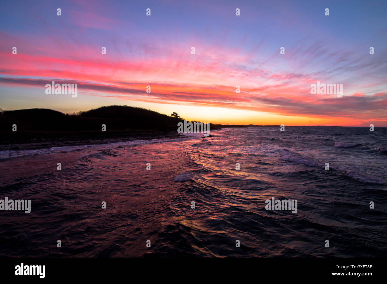 Colourful sunrise over the ocean Stock Photo - Alamy