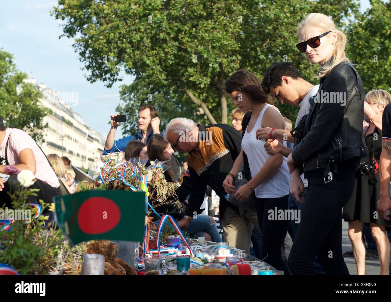 Tributes are laid in Paris in memory of the victims of the Nice terror ...