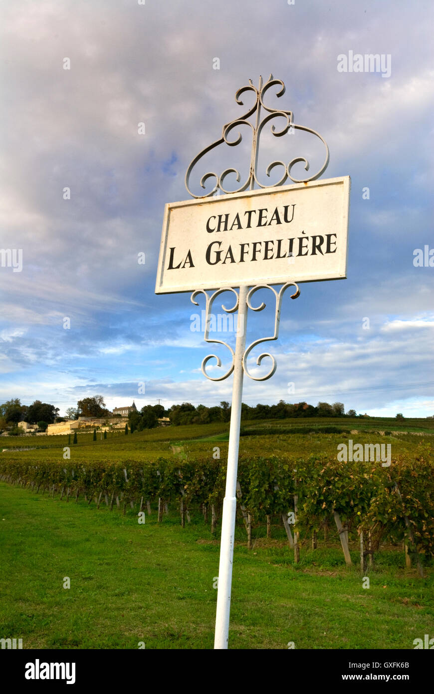Ornate metal sign for Chateau La Gaffeliere at border of vineyard Saint ...
