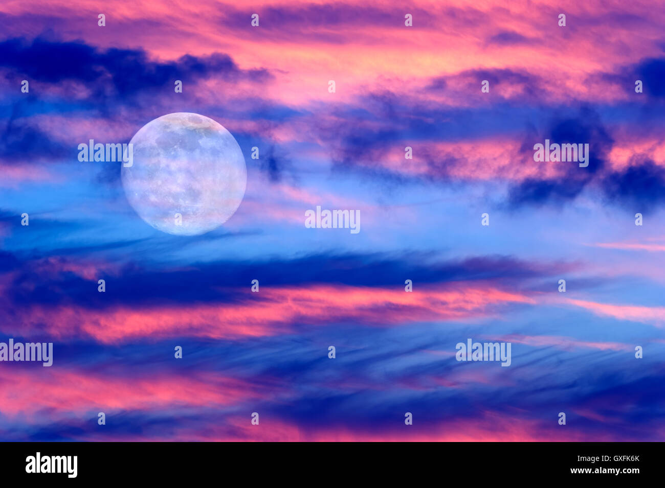 Moon clouds is a vibrant colorful surreal cloudscape with the full moon ...