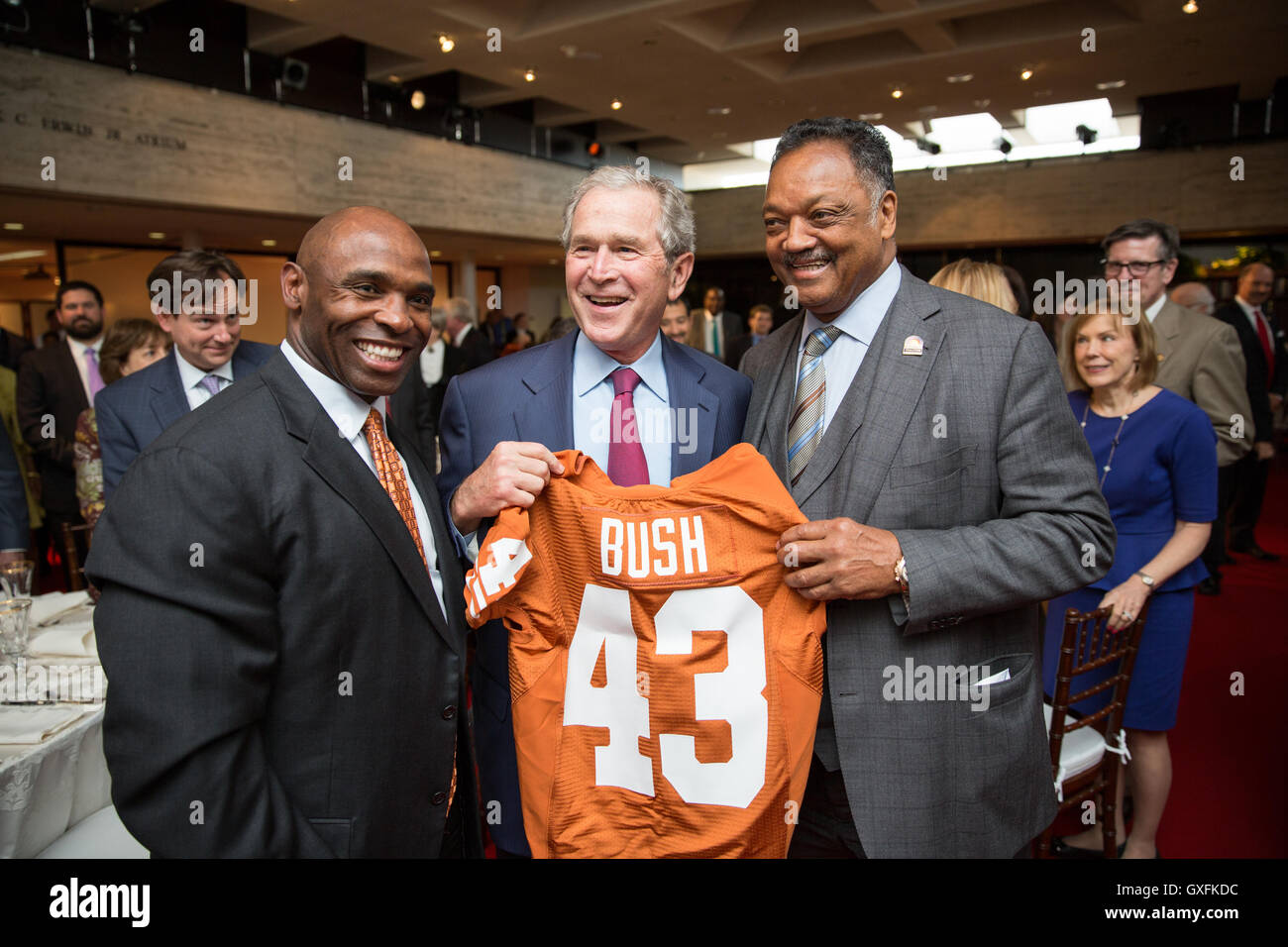 Former U.S. President George W. Bush shows off his custom UT football ...