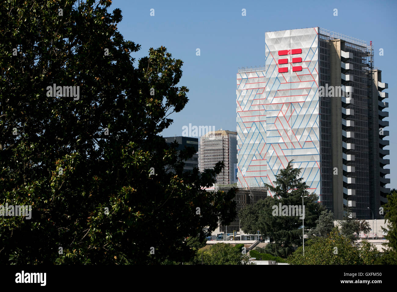 A logo sign outside of the future headquarters of Telecom Italia (TIM ...