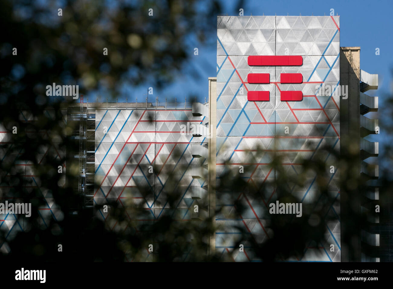 A logo sign outside of the future headquarters of Telecom Italia (TIM ...