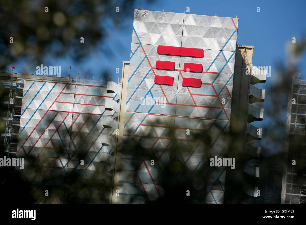A logo sign outside of the future headquarters of Telecom Italia (TIM ...