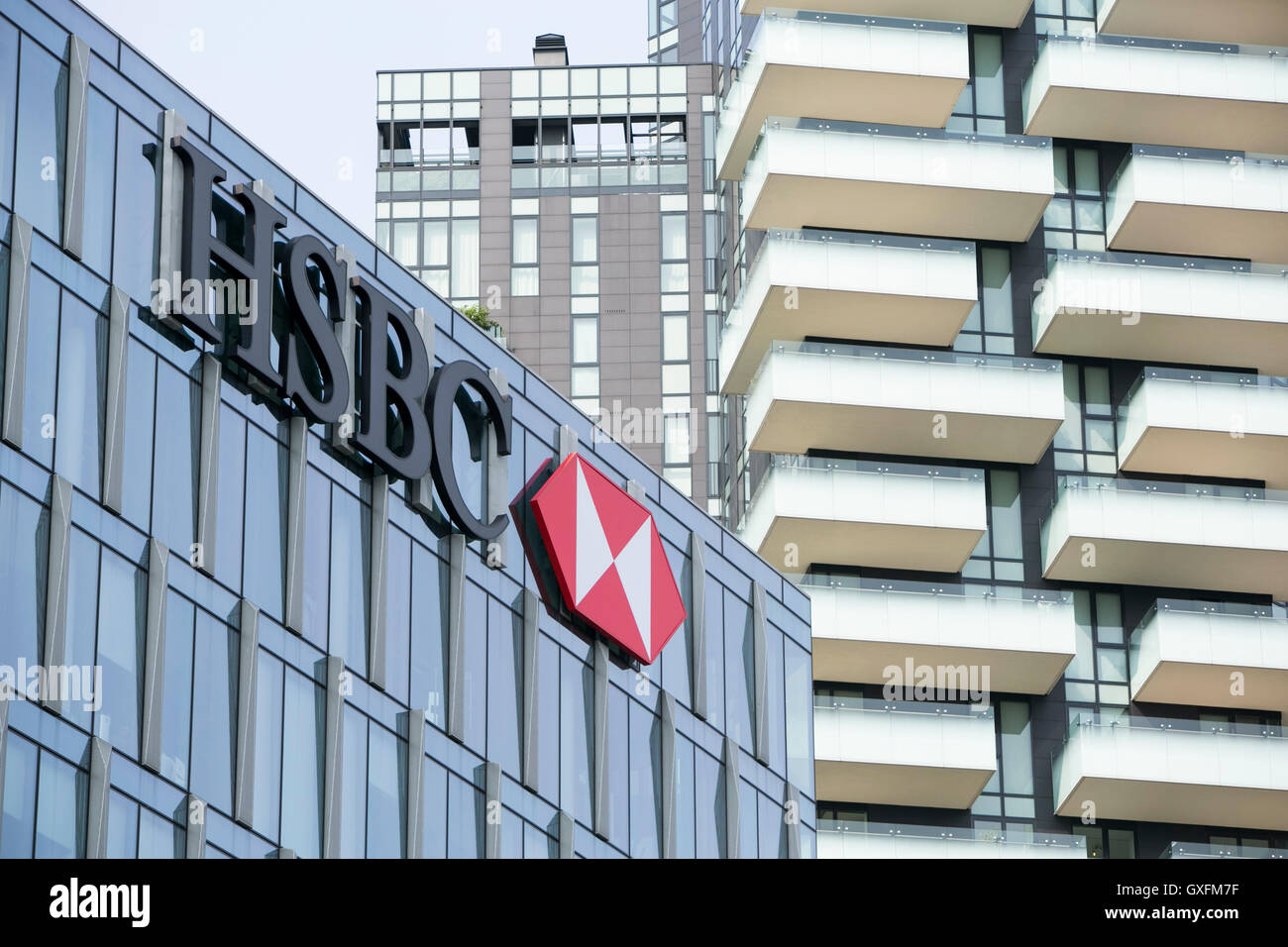 A logo sign outside of a facility occupied by HSBC Bank in Milan, Italy ...