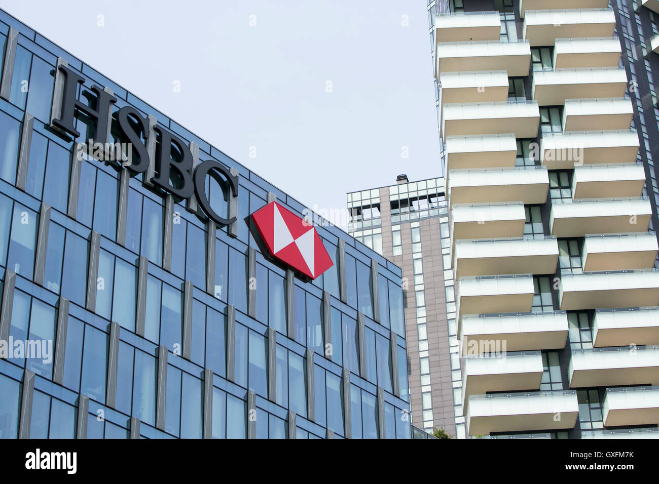 A logo sign outside of a facility occupied by HSBC Bank in Milan, Italy ...