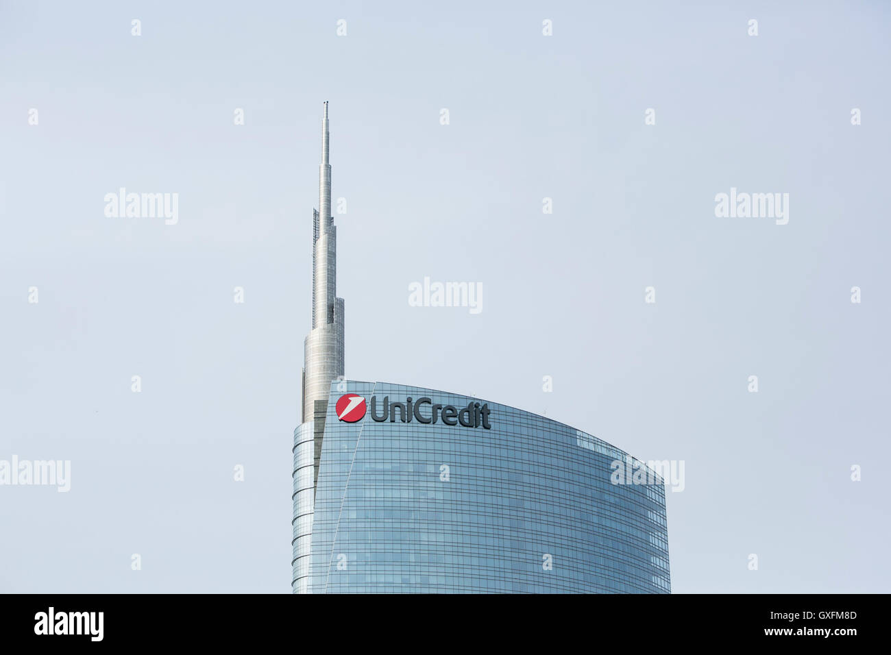 A logo sign outside of the headquarters of the UniCredit Group in Milan ...