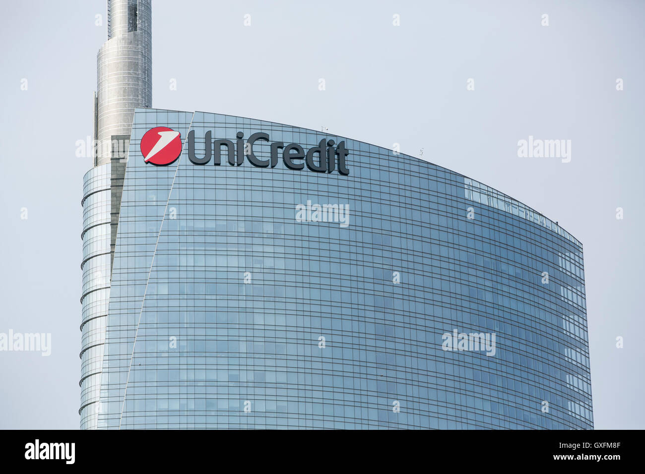 A logo sign outside of the headquarters of the UniCredit Group in Milan ...