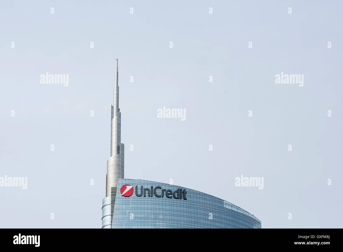 A logo sign outside of the headquarters of the UniCredit Group in Milan ...