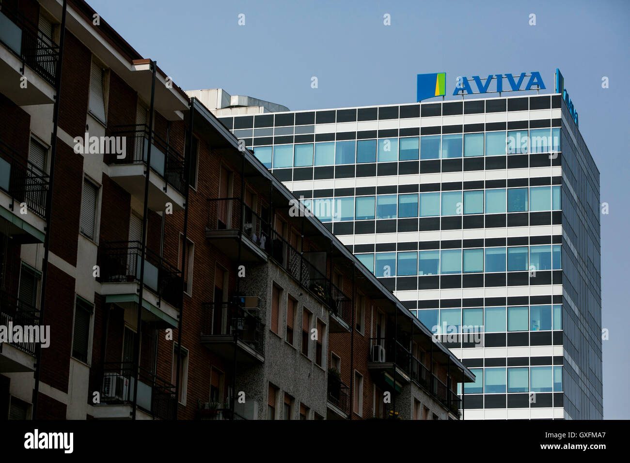 A logo sign outside of a facility occupied by Aviva in Milan, Italy on ...