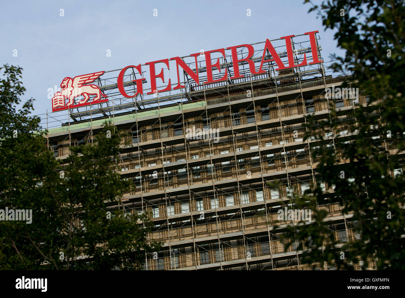 A logo sign outside of a facility occupied by the Generali Group in ...