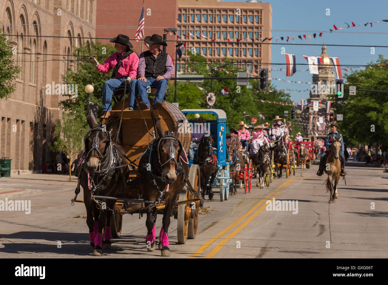 Cowboys soldiers dressed in period costume riding in the Cheyenne ...