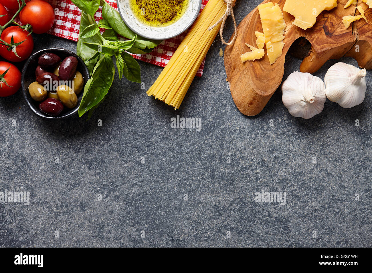 Italian food ingredients on stone background Stock Photo - Alamy