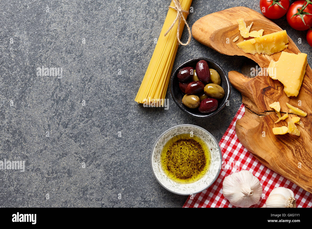 Italian food ingredients on stone background Stock Photo - Alamy