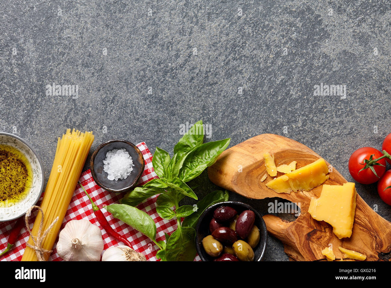 Italian food ingredients on stone background Stock Photo - Alamy