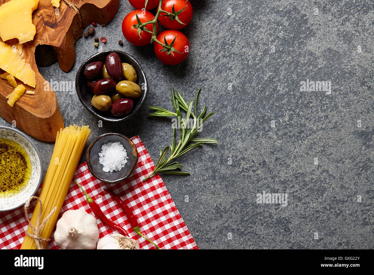 Italian food ingredients on stone background Stock Photo - Alamy