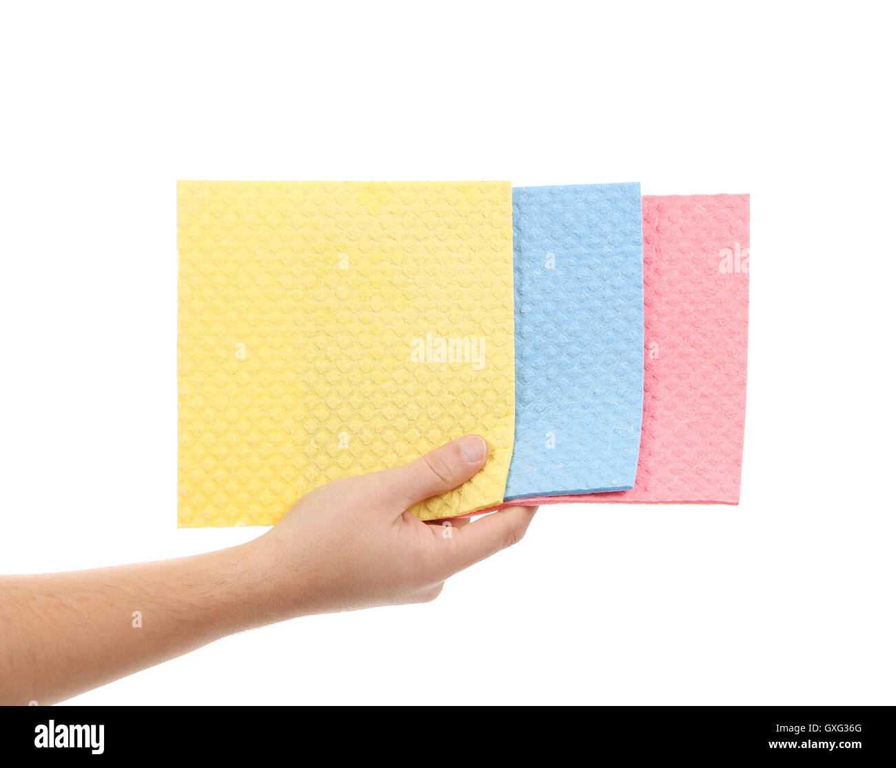 Hand holds different sponges Stock Photo - Alamy